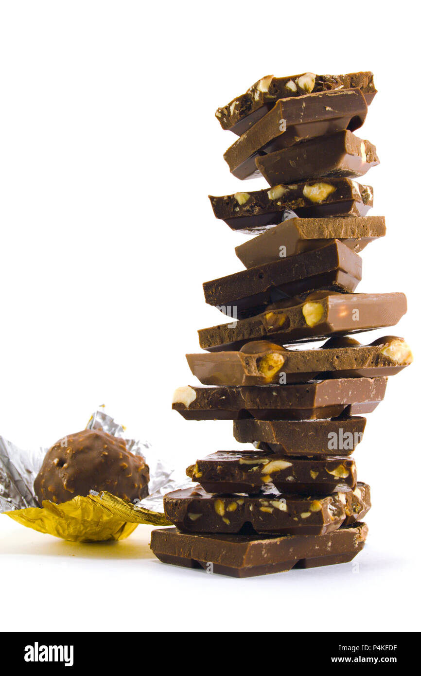 chocolate pyramid and ball on white Stock Photo - Alamy