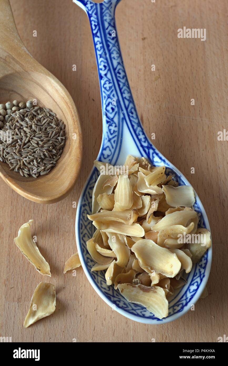 Fried lilly bulbs and spices Stock Photo - Alamy