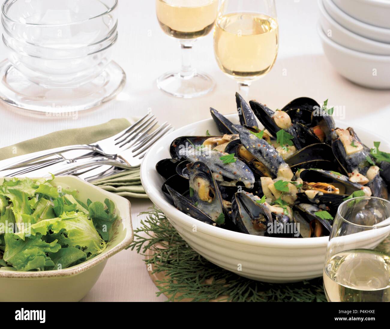 Mussels in cider with coarse mustard Stock Photo - Alamy