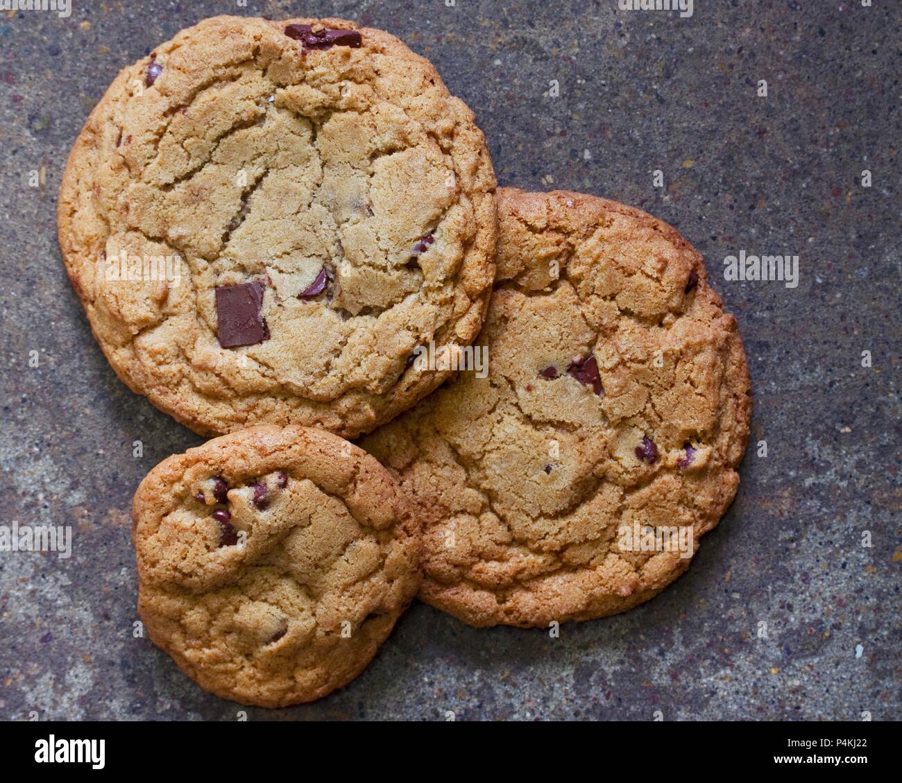 Three chocolate chip cookies (seen from above Stock Photo - Alamy
