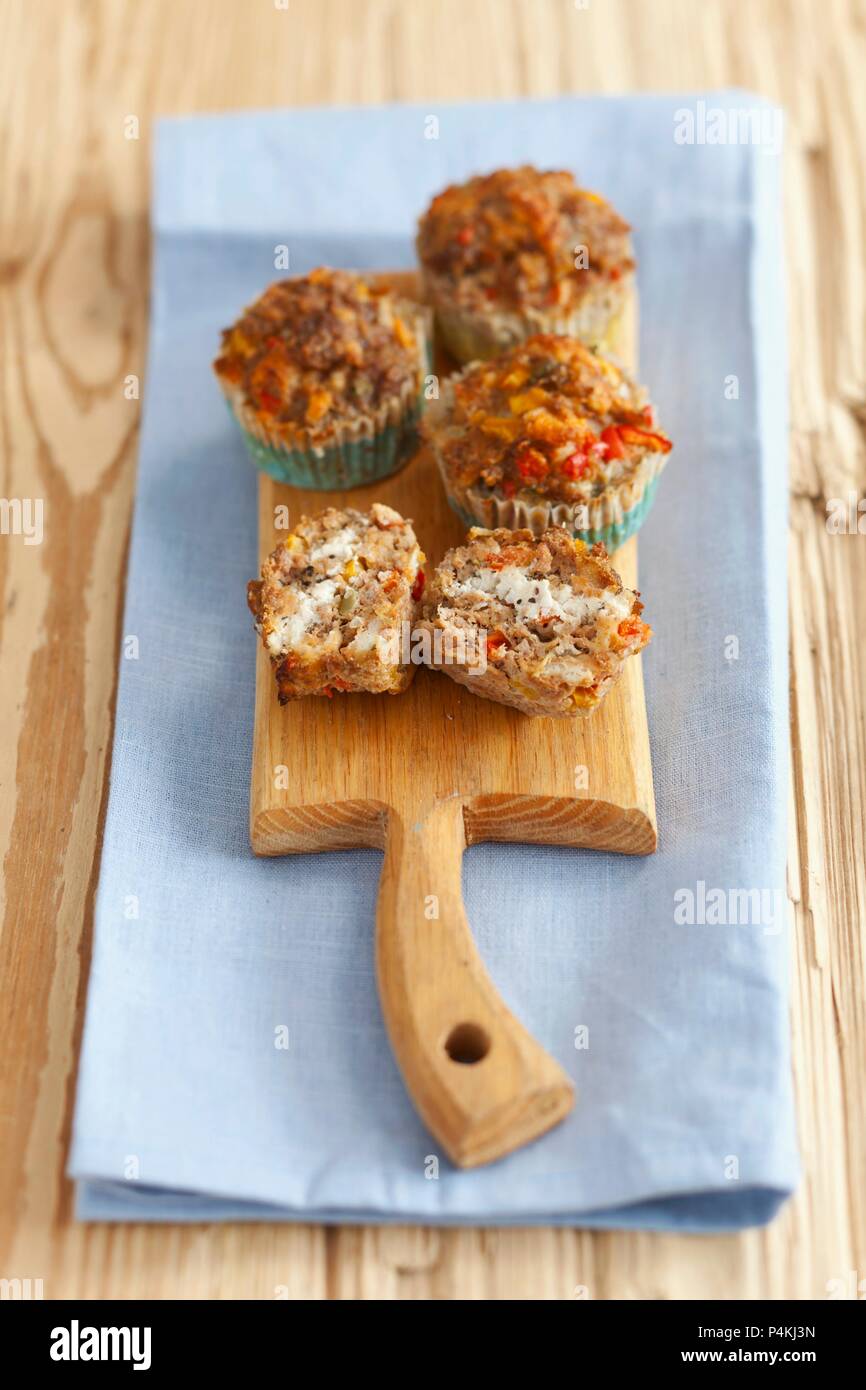 Minced meat muffins with goat's cheese Stock Photo - Alamy