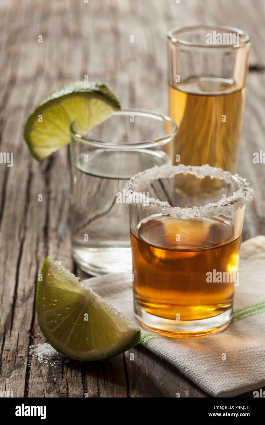 Tequilla shots: blanco, joven and reposado Stock Photo - Alamy