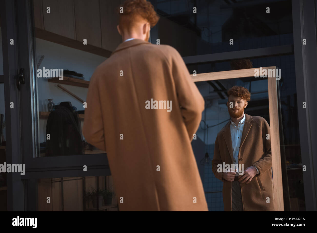 Man overcoat back hi-res stock photography and images - Alamy