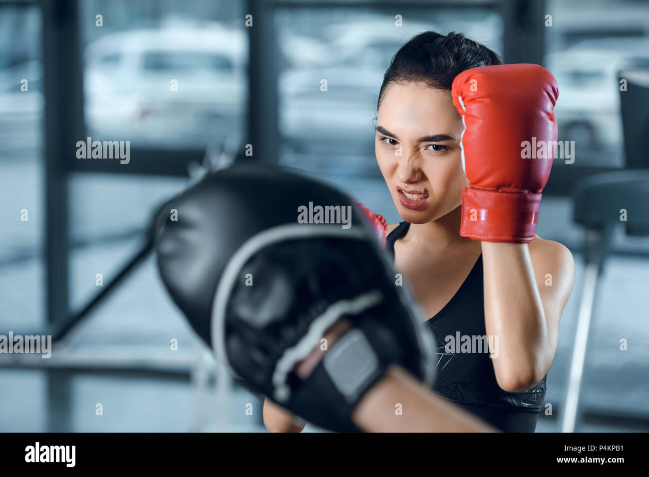 Attractive asian female boxer training hi-res stock photography and ...
