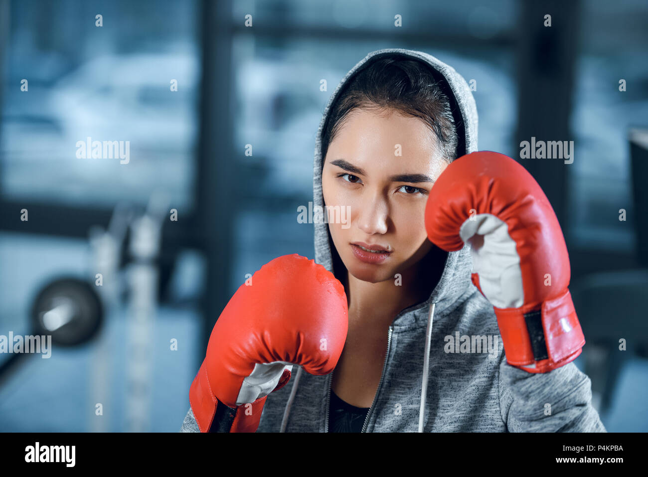 Attractive asian female boxer training hi-res stock photography and ...