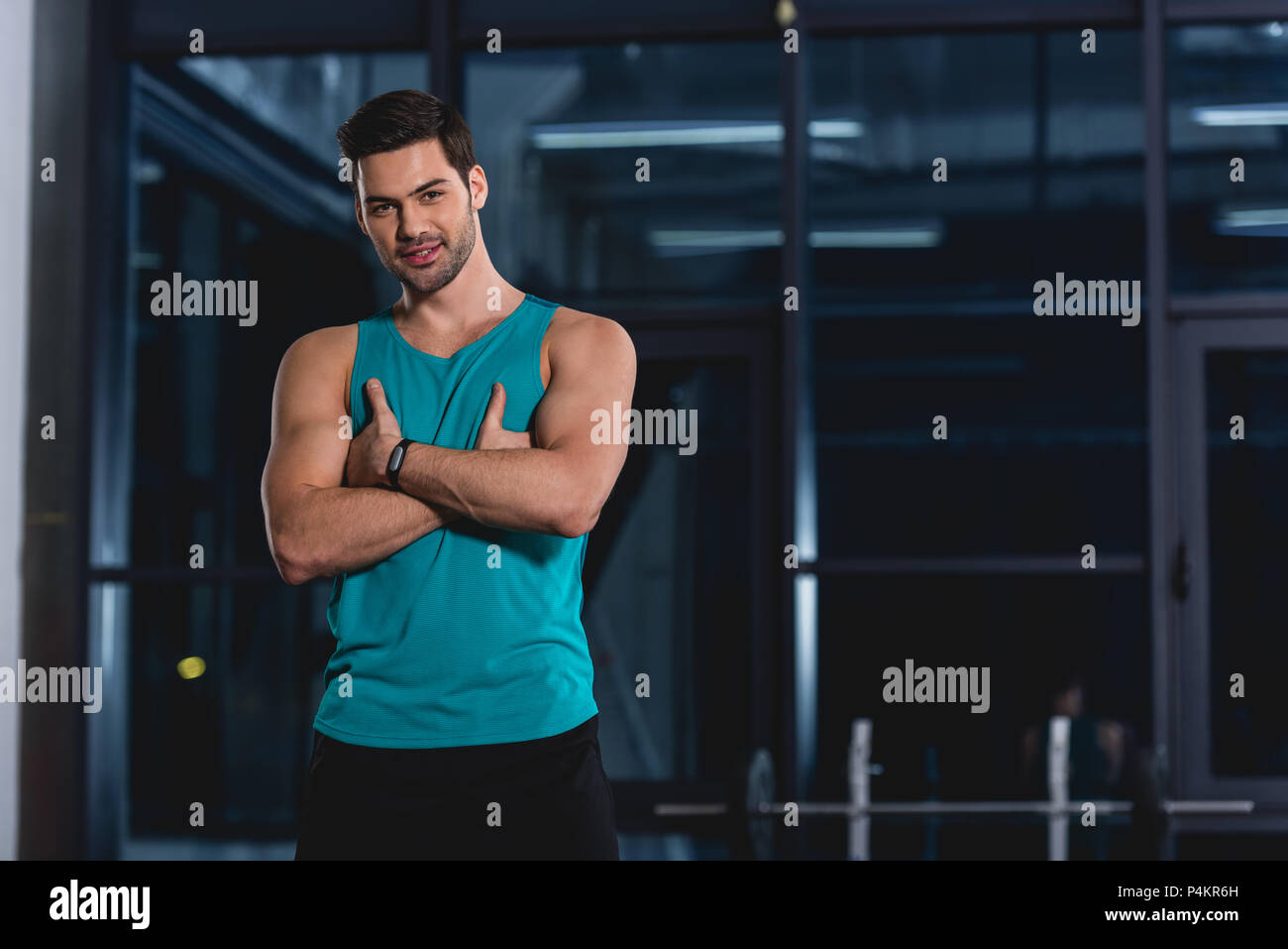 Muscular sportsman posing in hi-res stock photography and images - Alamy