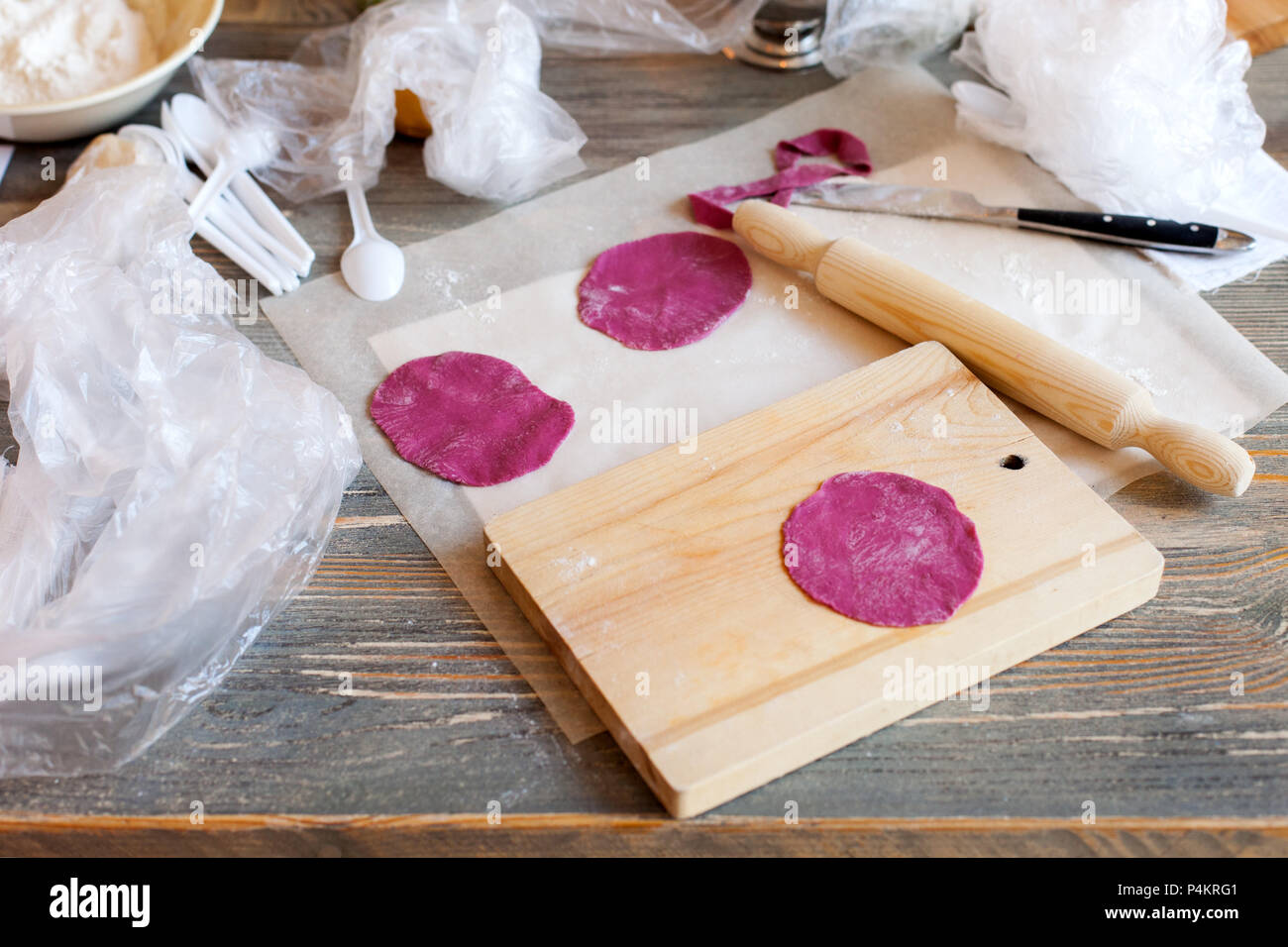 Cooking class, culinary. Food and people concept, molding of pelmeni or ...