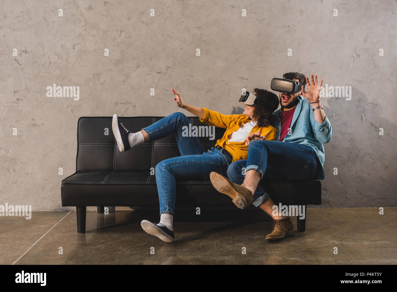 Young couple using vr glasses hi-res stock photography and images - Alamy
