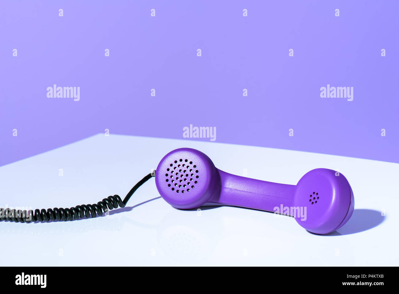 plastic purple telephone handset, ultra violet trend Stock Photo - Alamy