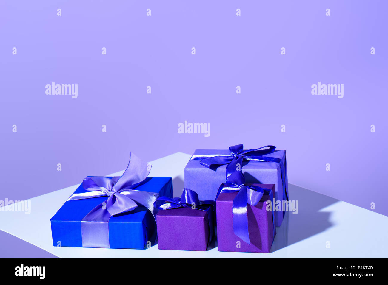 purple and violet gift boxes with bows, ultra violet trend Stock Photo ...