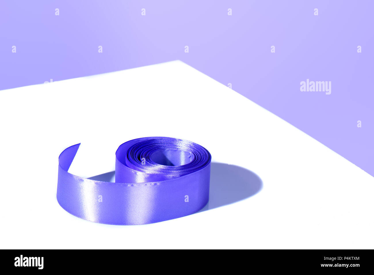 decorative ultra violet ribbon, on white surface Stock Photo - Alamy