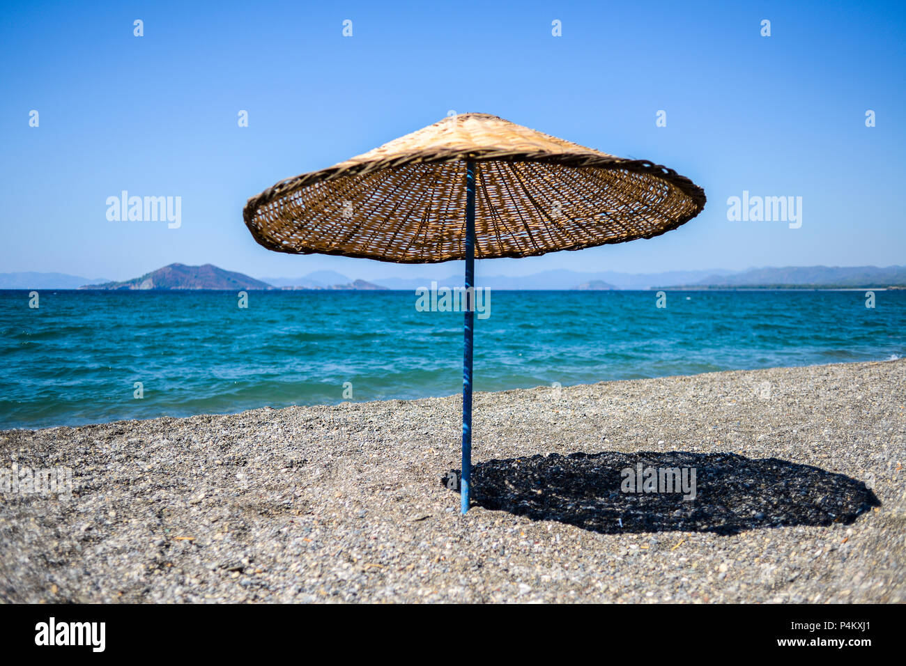Sun umbrella on the beach in Turkey Stock Photo - Alamy