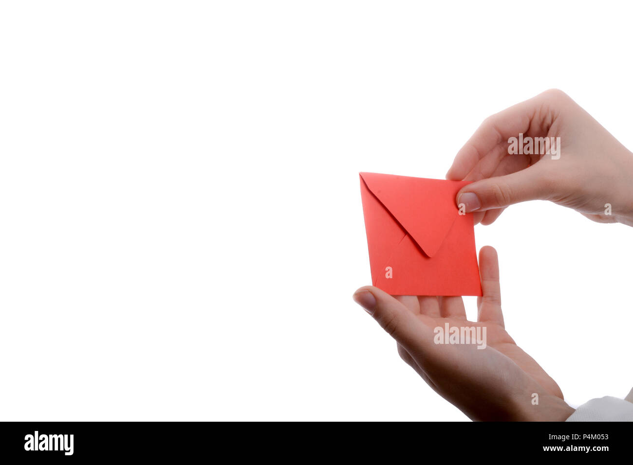 hand holding a red envelope on a white background Stock Photo - Alamy
