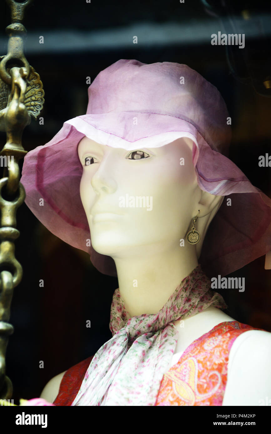 female mannequin in a hat in a shop window Stock Photo - Alamy