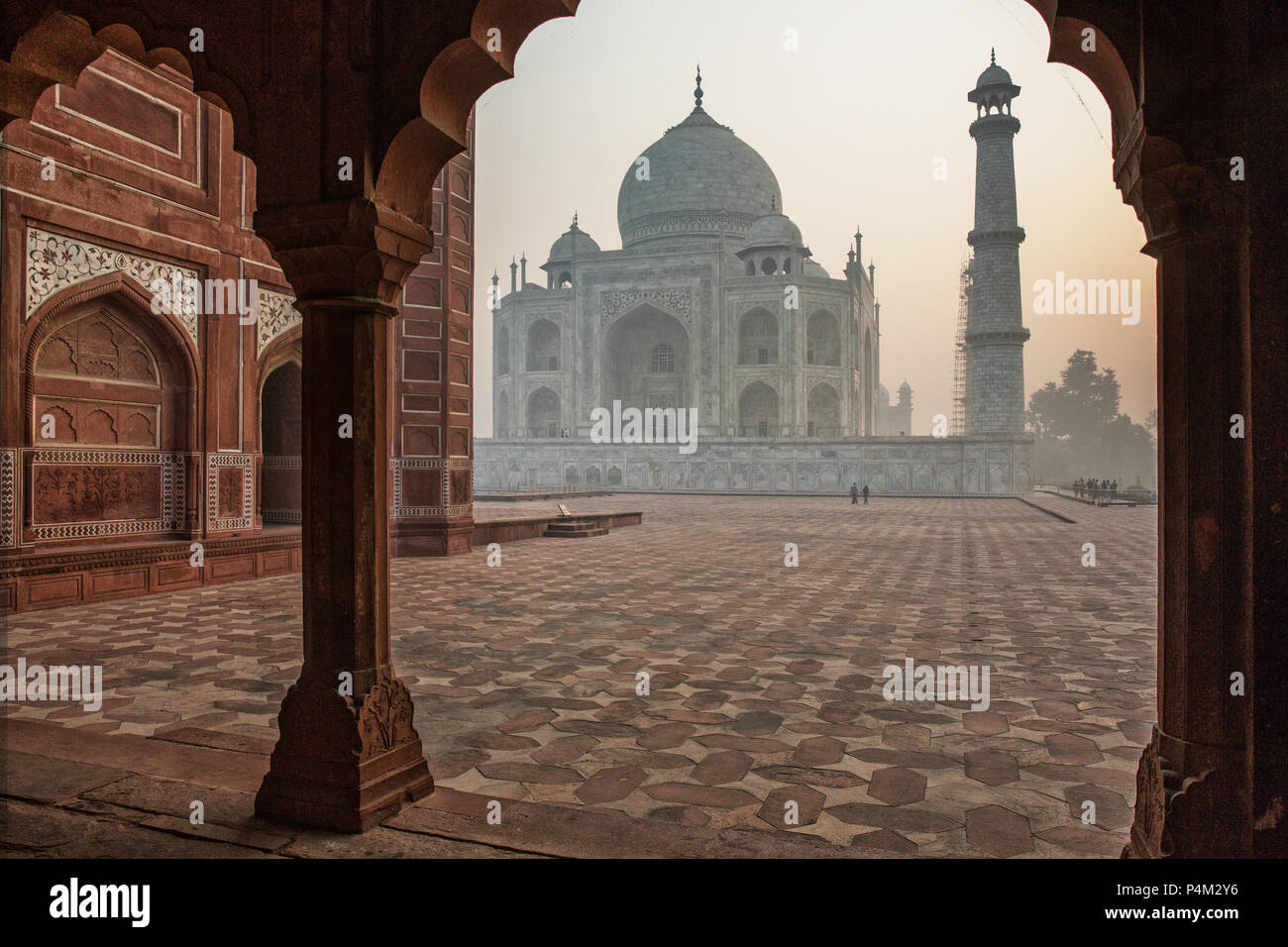 Taj mahal just after sunrise. It can barely be seen due to the high air ...