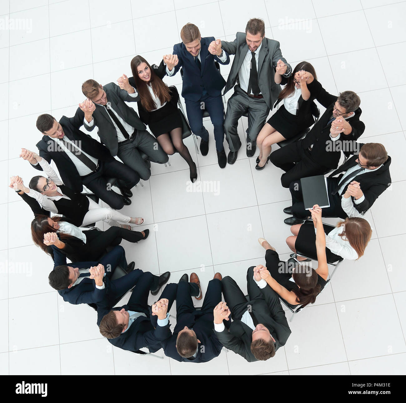 concept of team building.large business team sitting in a circle Stock ...