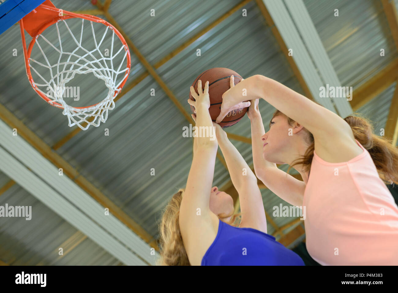 girls playing basketball Stock Photo - Alamy