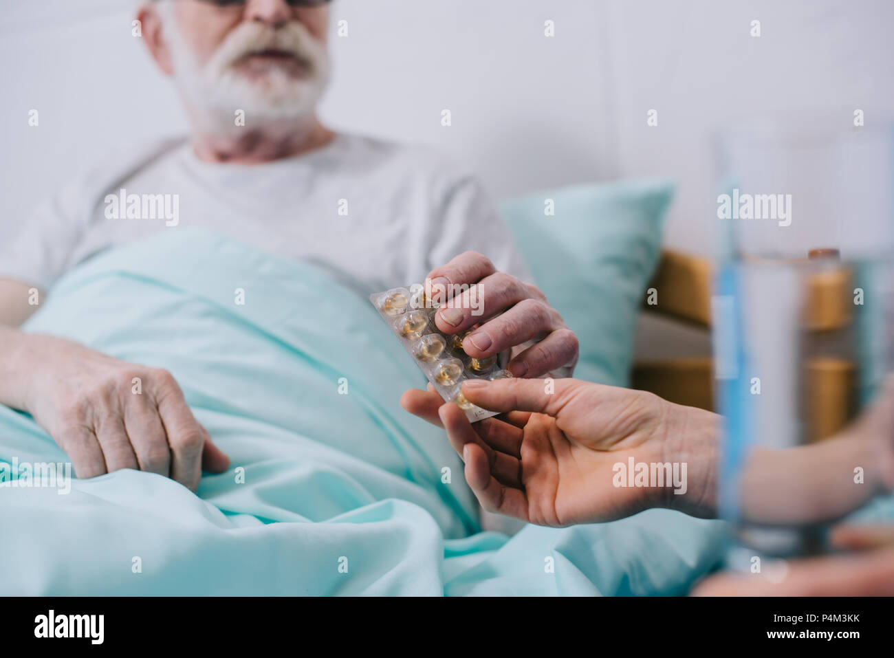 Doctor giving medications pills hi-res stock photography and images - Alamy