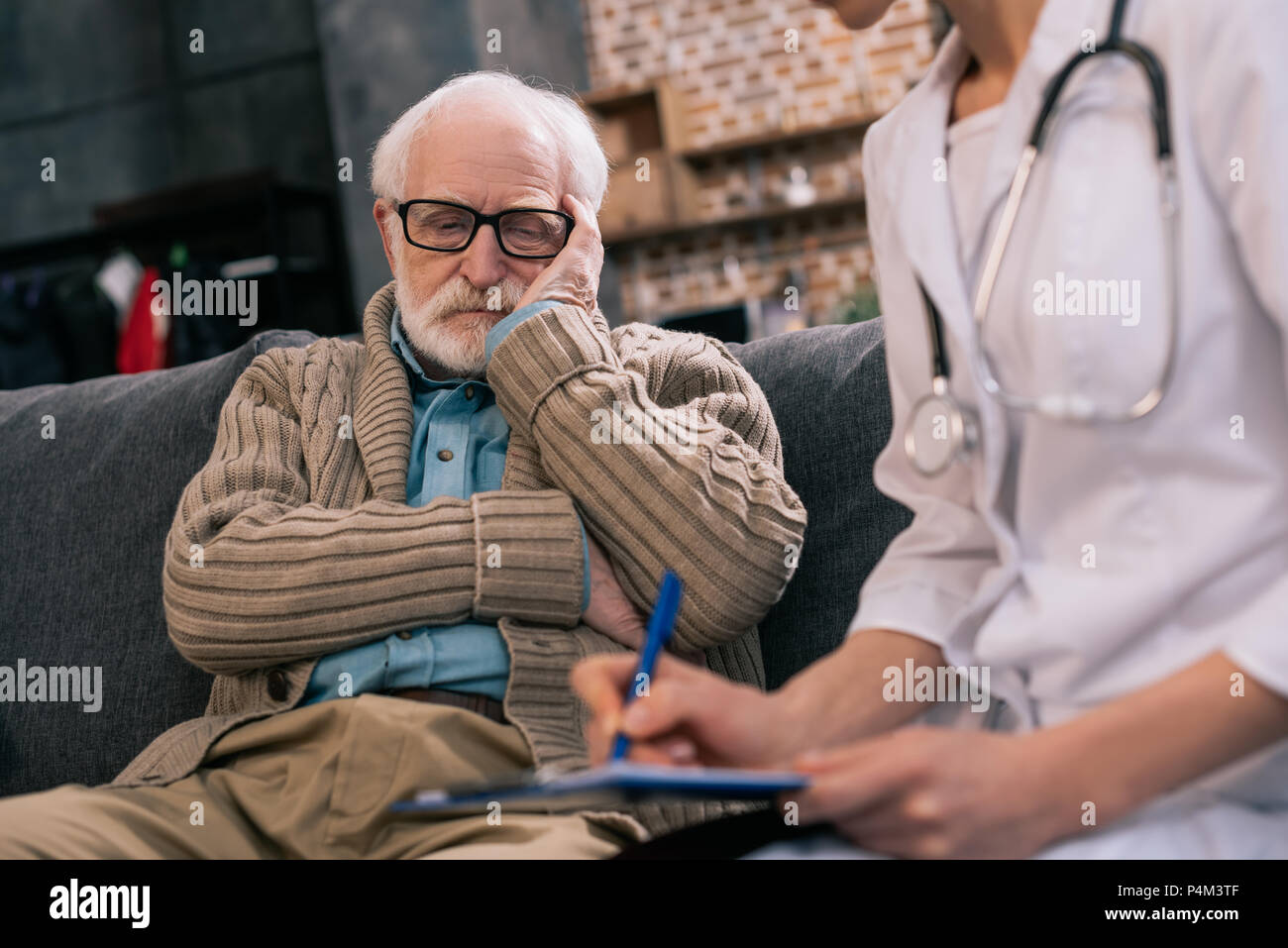 Sad man writing hi-res stock photography and images - Alamy