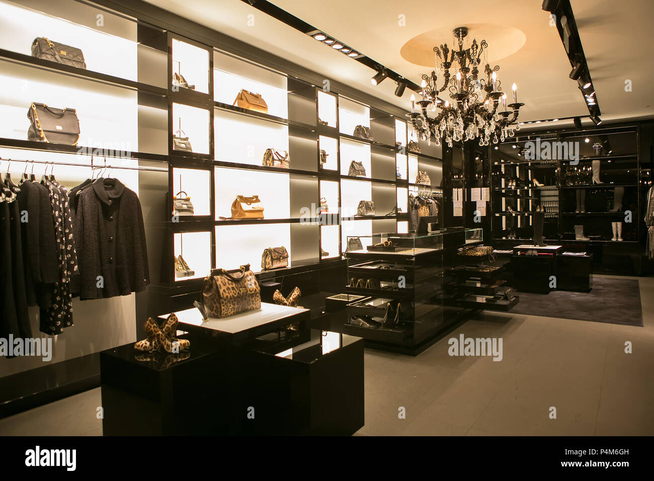 bright and fashionable interior of shoe store in modern mall Stock ...