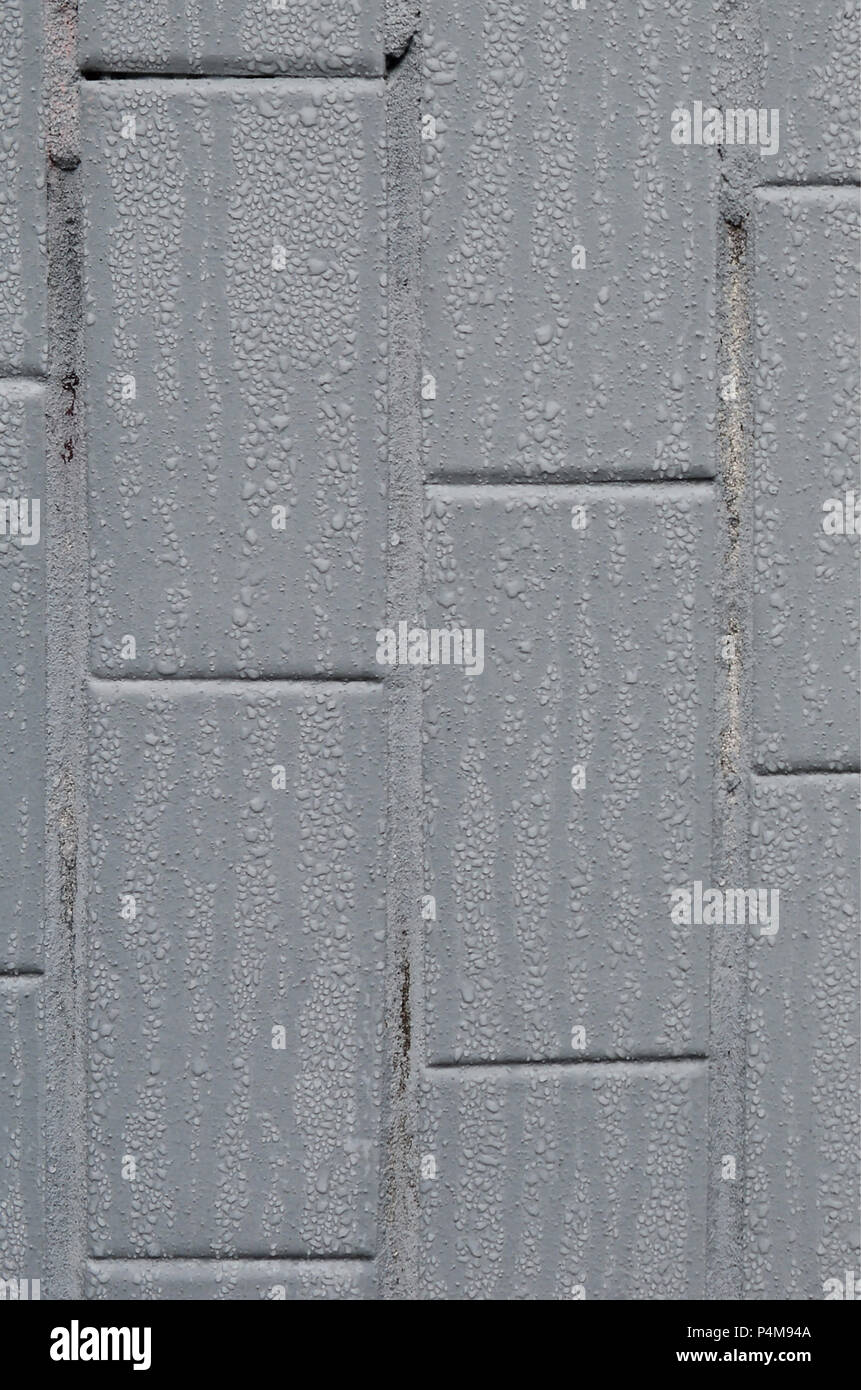 The texture of the wall from the old tile, painted gray under the ...