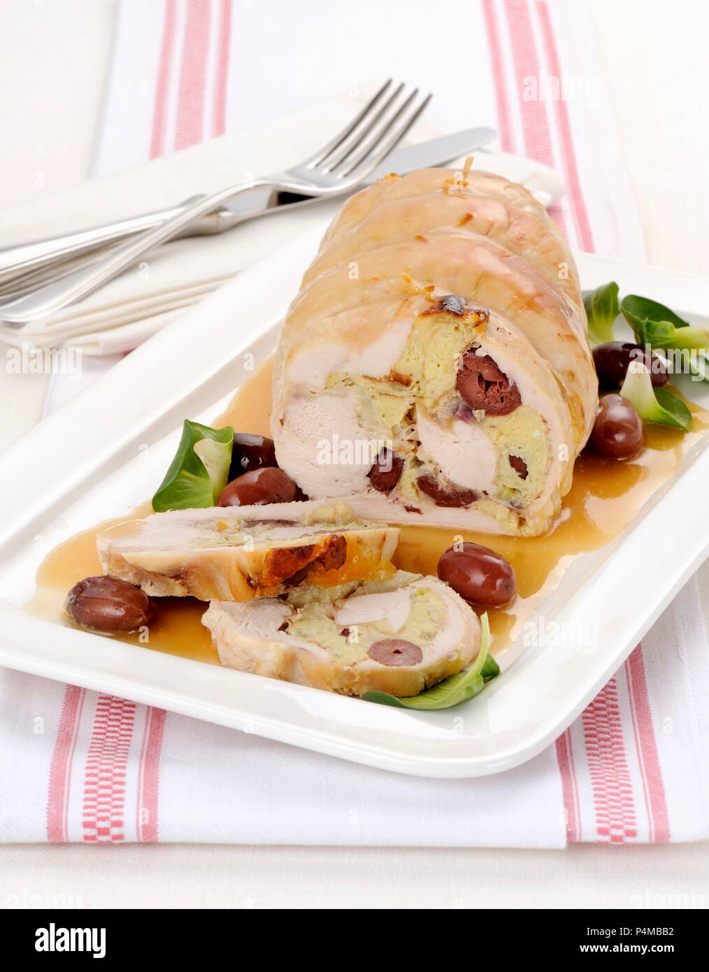 Pork roulade filled with olives and bread Stock Photo - Alamy