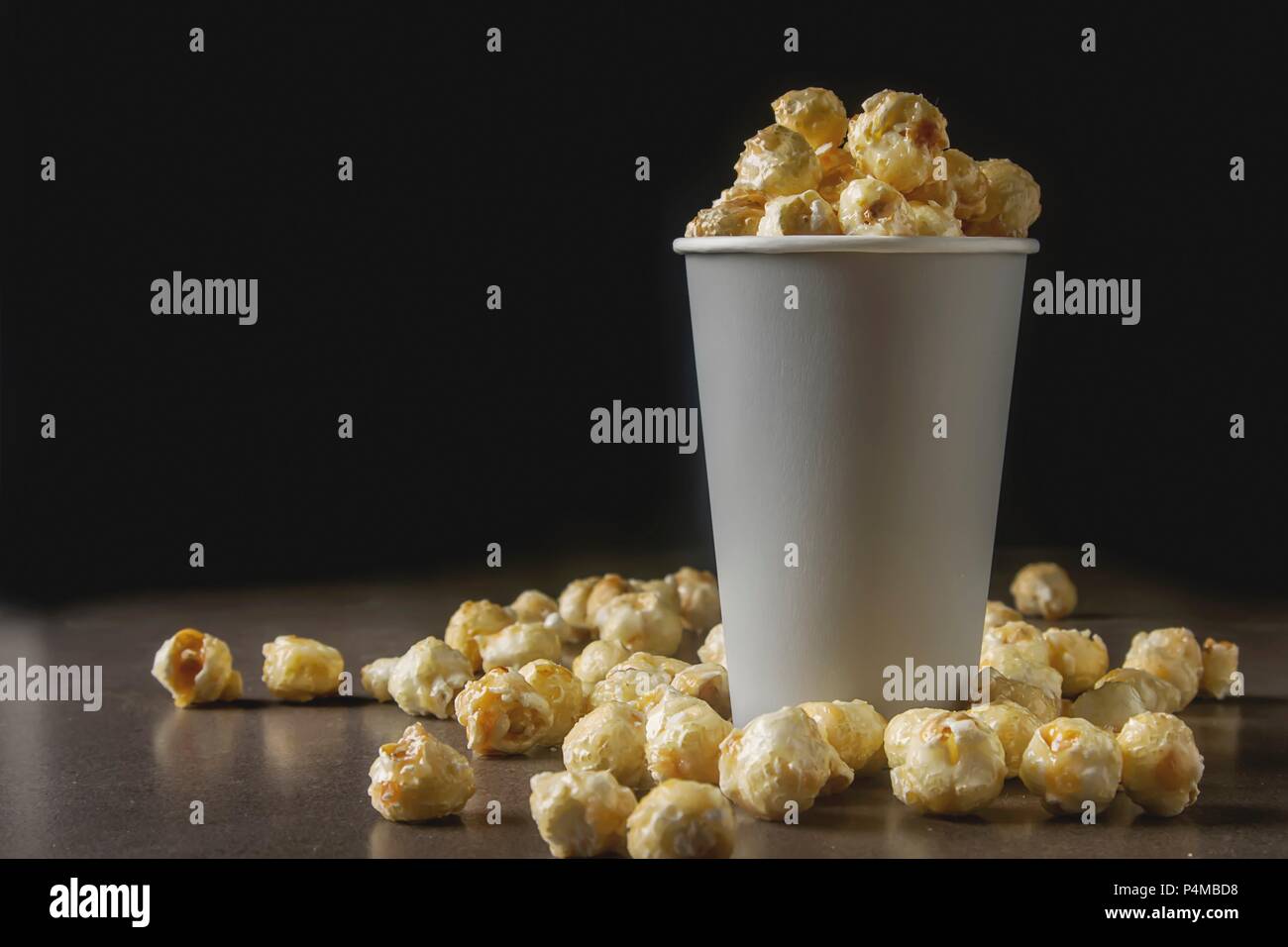 Popcorn in a cup Stock Photo - Alamy