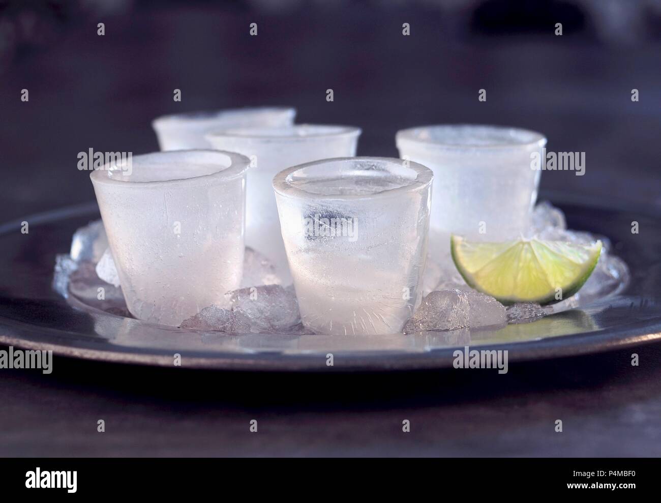 Frozen Vodka Shots on a Tray with Lime Stock Photo - Alamy