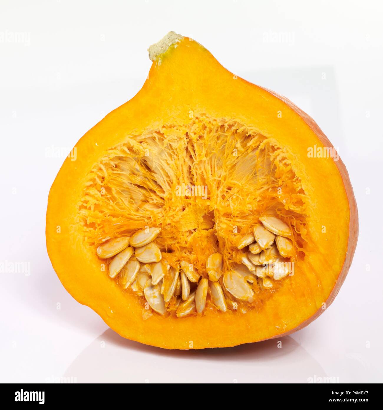 Pumpkin cut in half seeds hi-res stock photography and images - Alamy