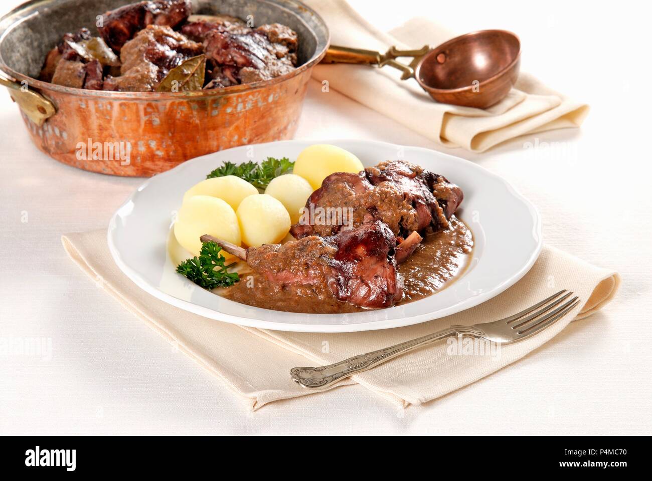 Lepre in civet (Italian venison braised in red wine Stock Photo - Alamy