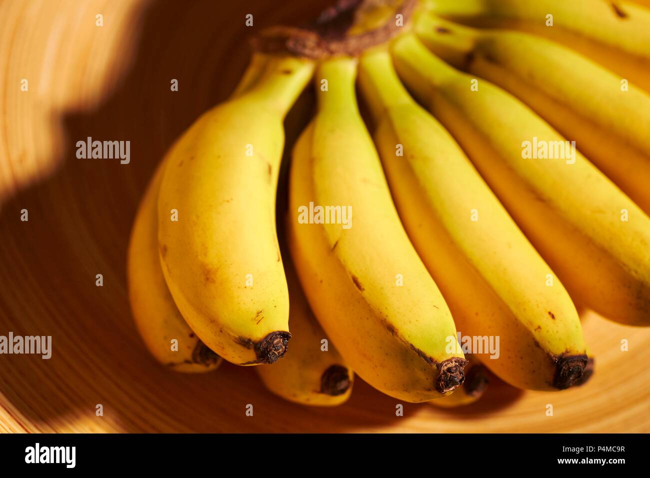 Hand of bananas hi-res stock photography and images - Alamy