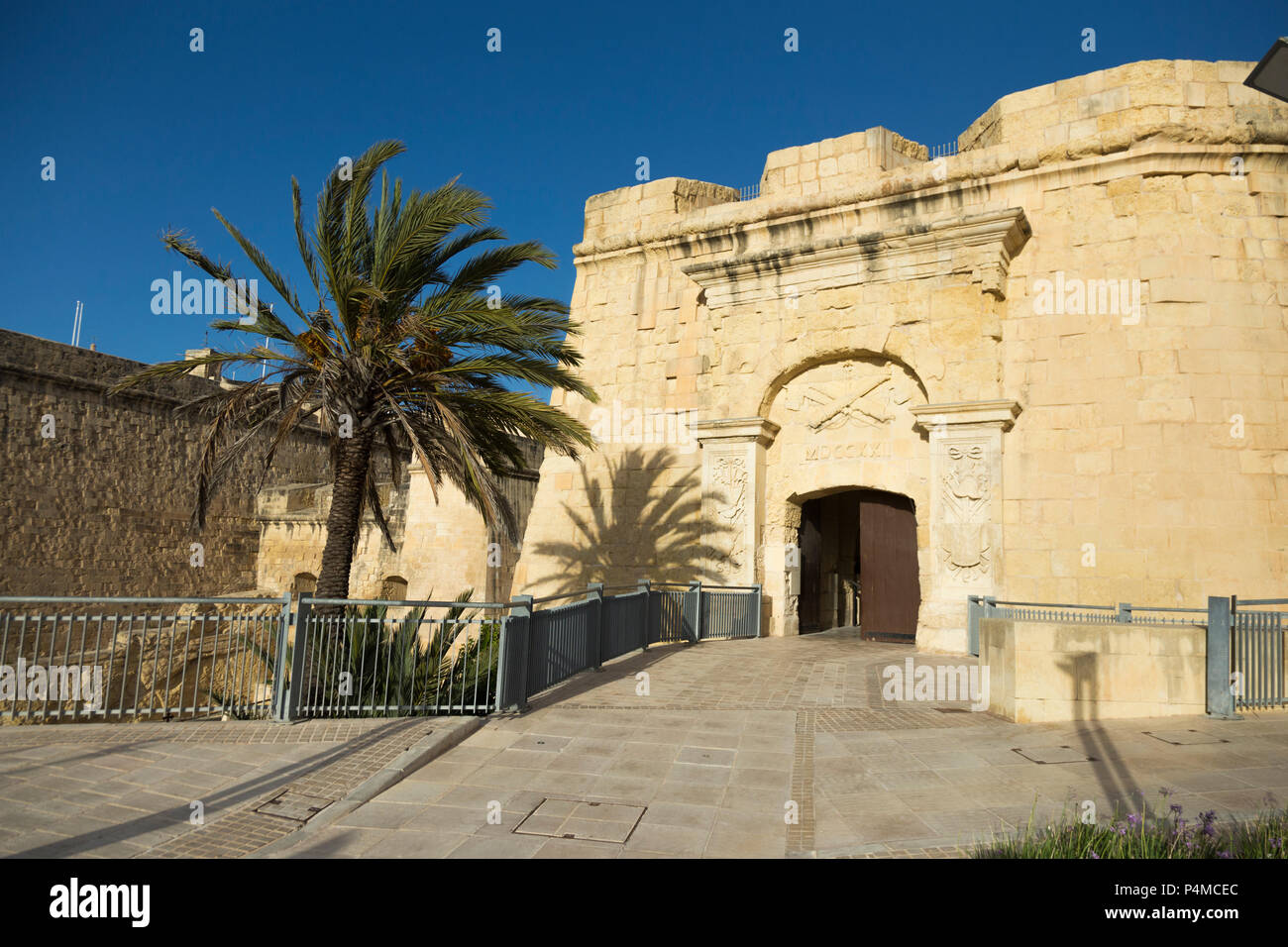 The approach to the entrance / outside / exterior facade and door of ...
