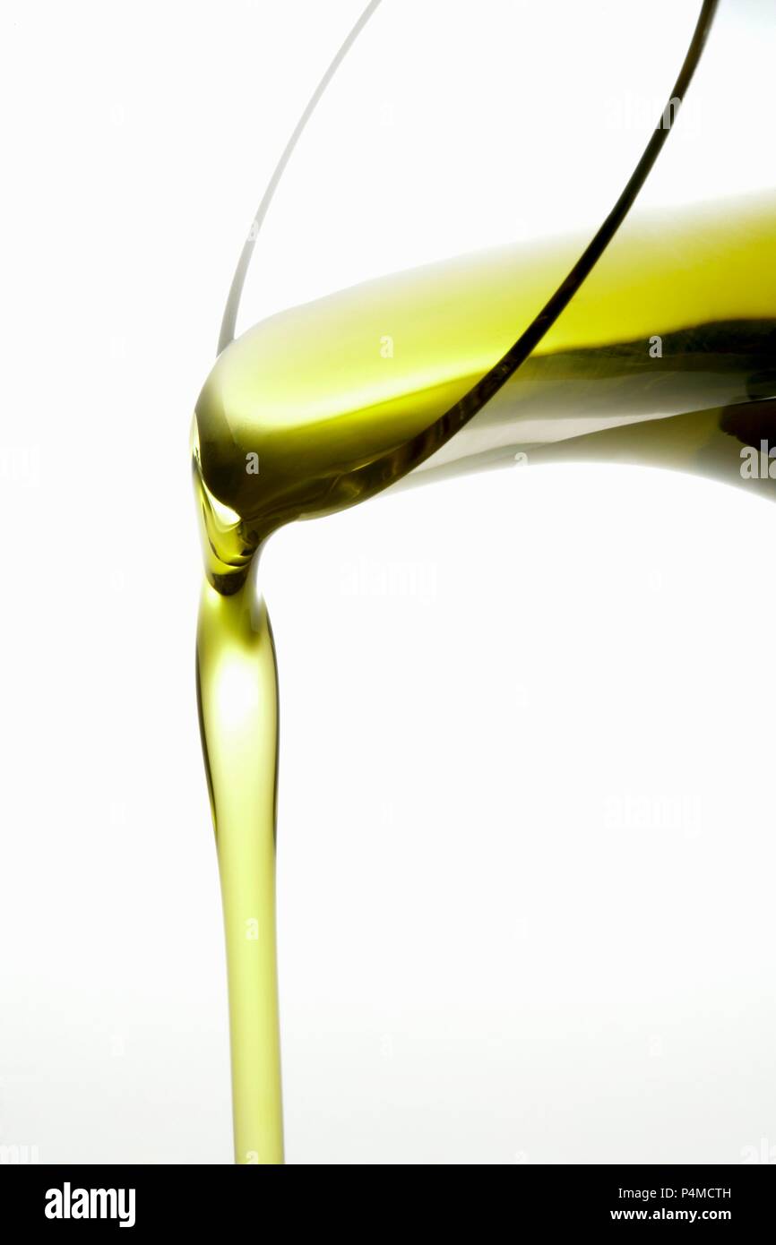 Olive Oil Pouring Stock Photo - Alamy
