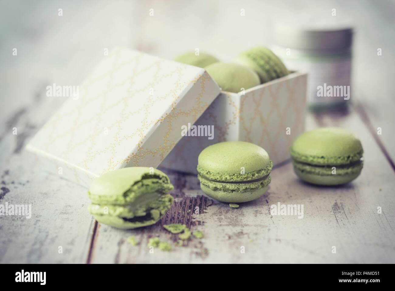 Matcha macaroons with a gift box Stock Photo - Alamy