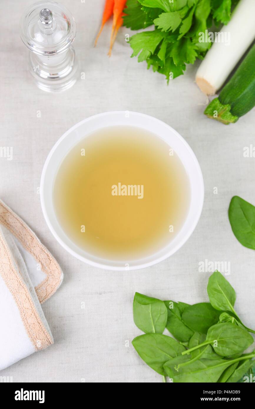 Clear vegetable broth in a soup bowl Stock Photo - Alamy