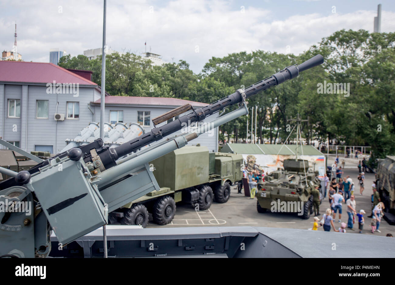 Machine gun on modern military battleship. Modern russian military cars ...