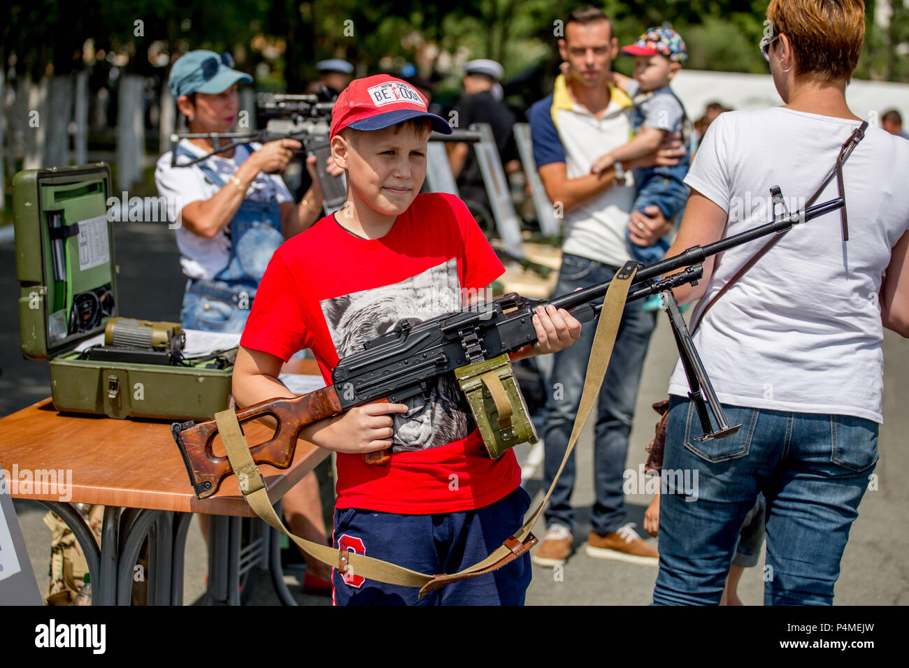 Russia, Vladivostok, 06/26/2017. Young man with PK machine gun (know as ...