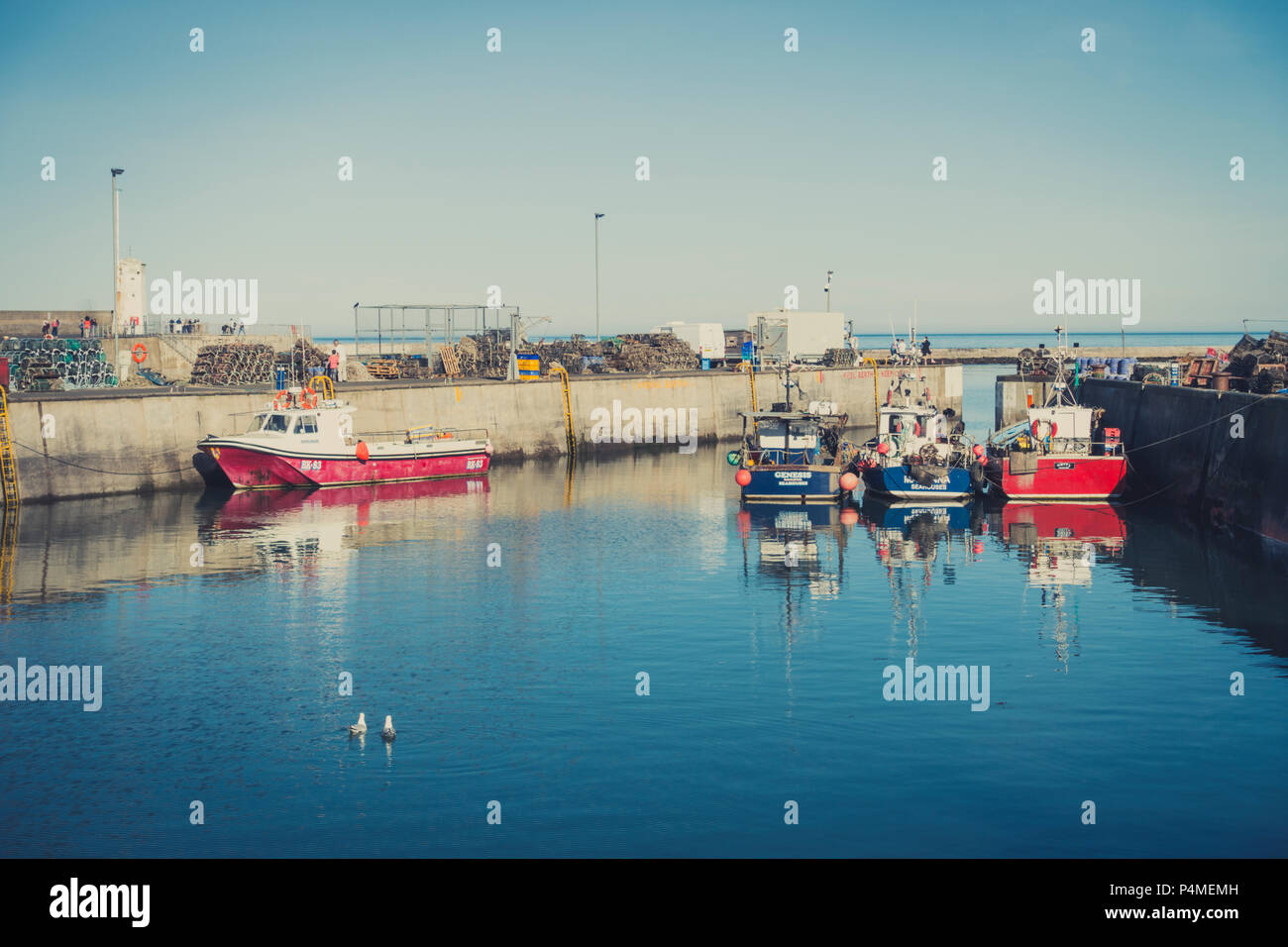 Fishing boats in Seahouses harbour Stock Photo - Alamy