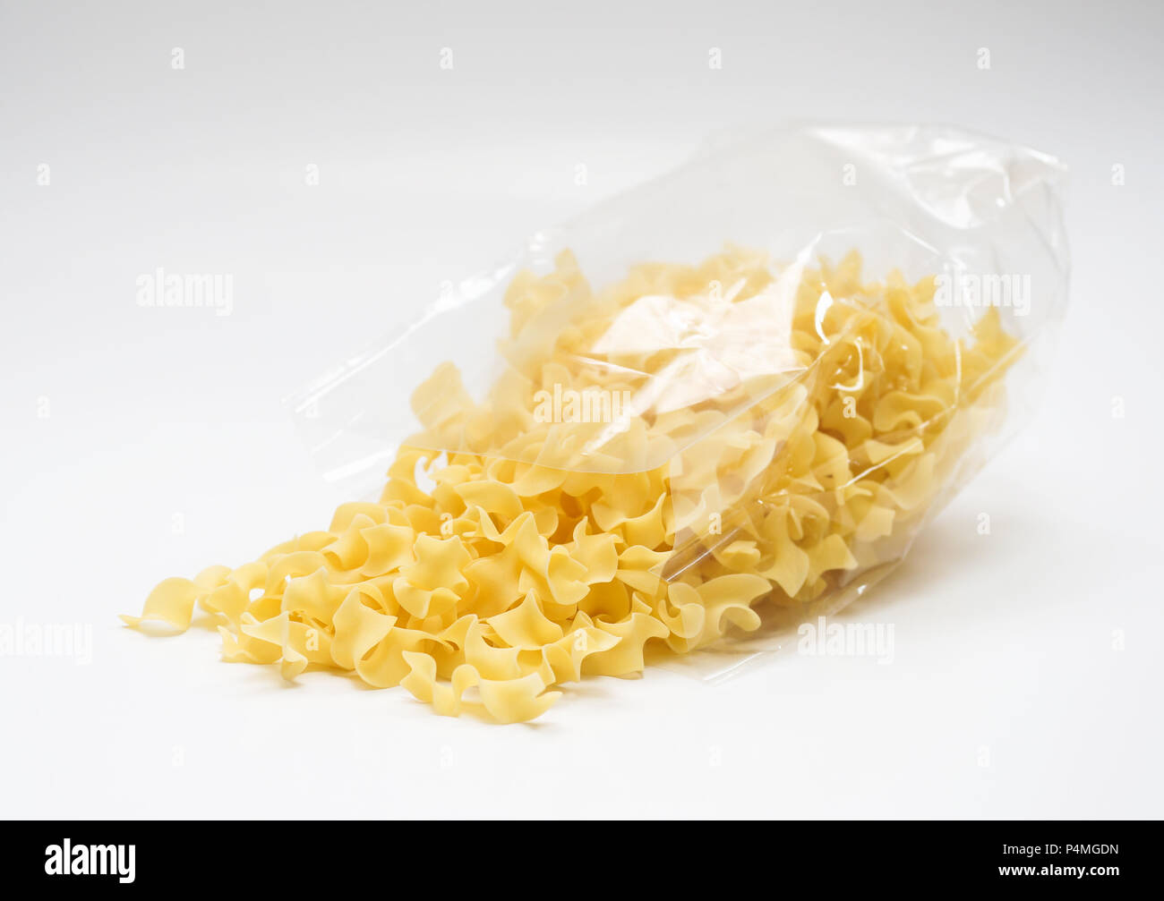 Transparent plastic pasta bag "tagliatelle girate " on white background ...