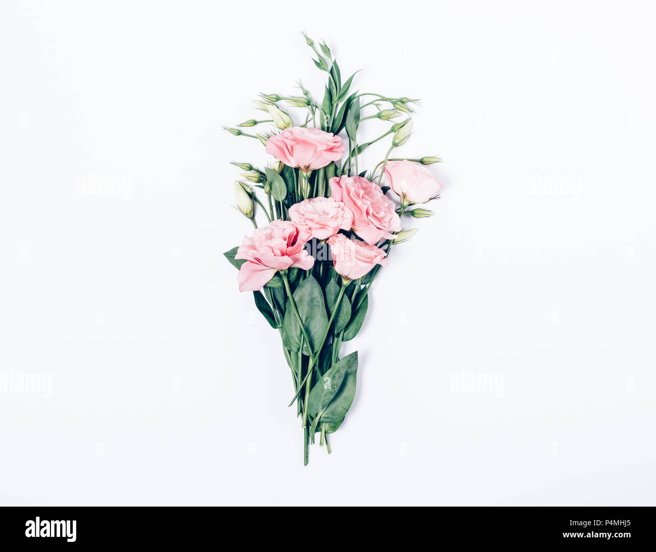 Blooming pink flowers bouquet laying on white background, top view ...
