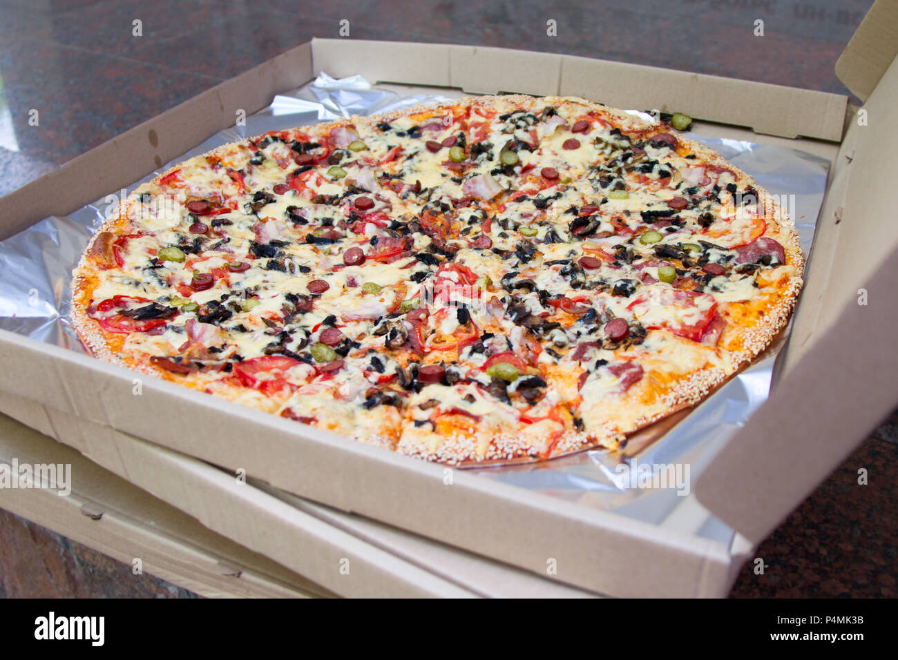 Pizza in a cardboard box Stock Photo - Alamy