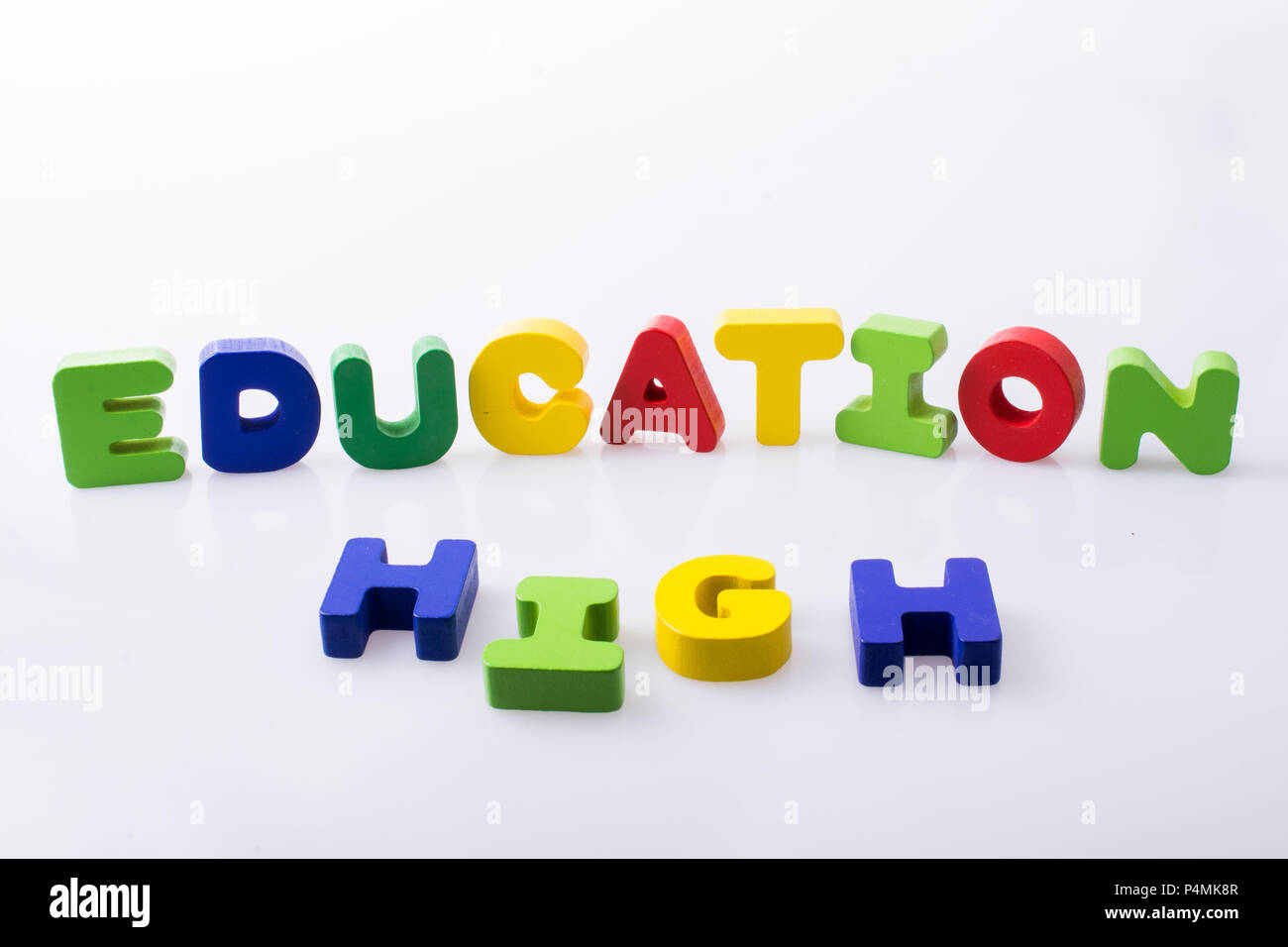 the word HIGH EDUCATION written with colorful letter blocks Stock Photo ...
