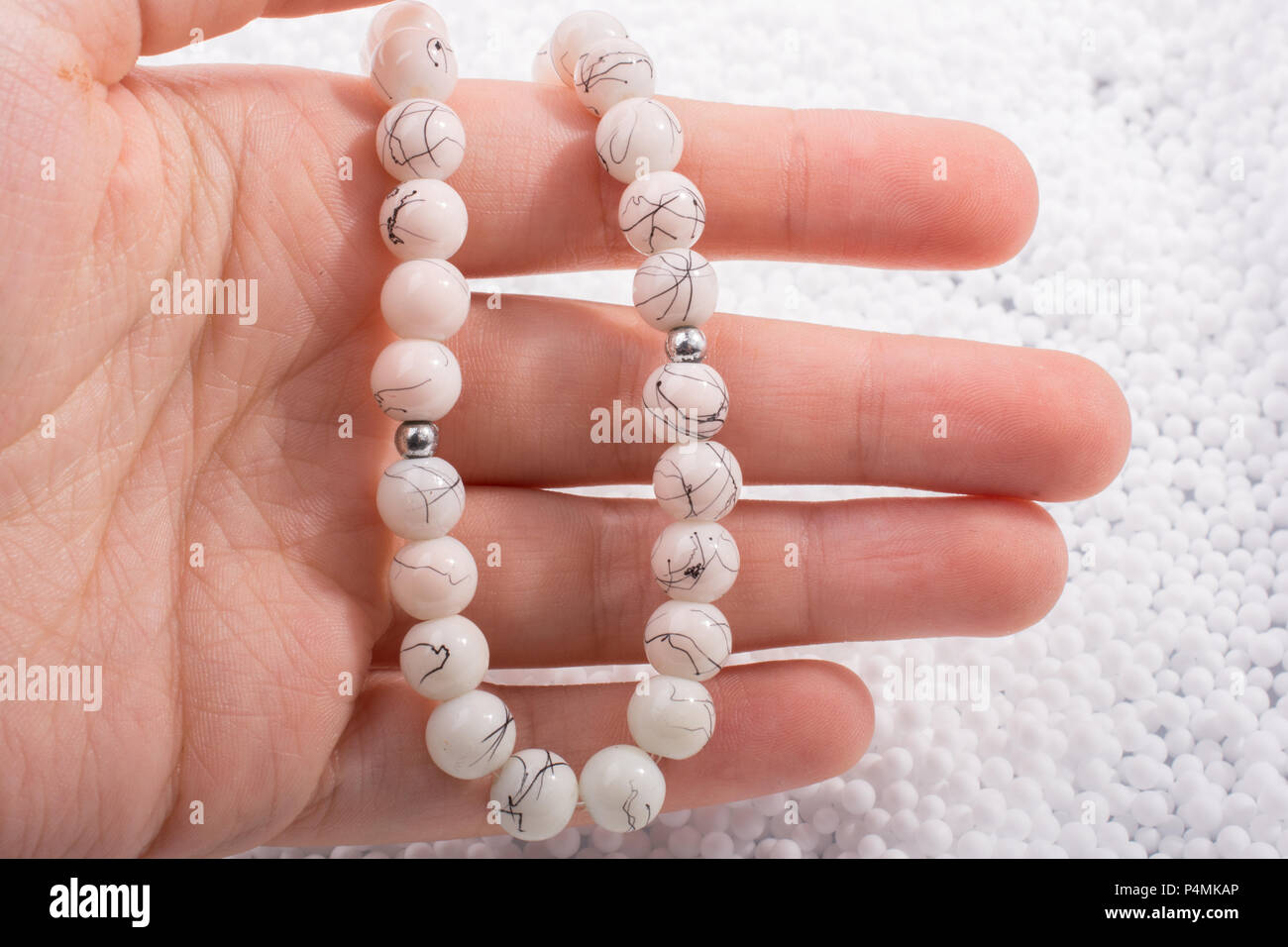 Set of some praying beads of various colors in hand Stock Photo - Alamy
