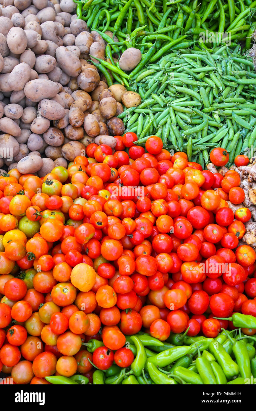 Close up of vegetables at the street market in Jaipur, India. Jaipur is ...