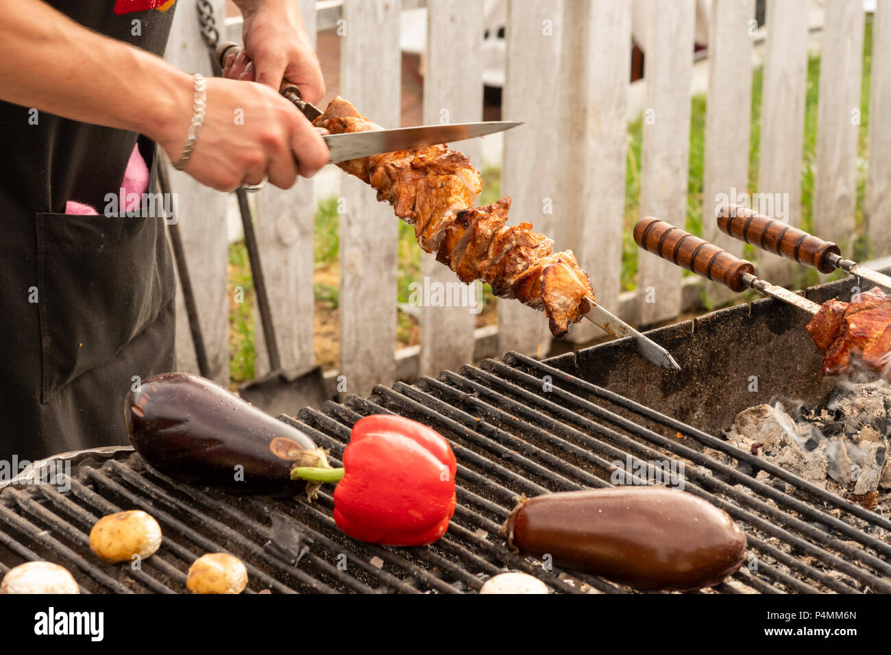 Cooking kebabs over open hi-res stock photography and images - Alamy