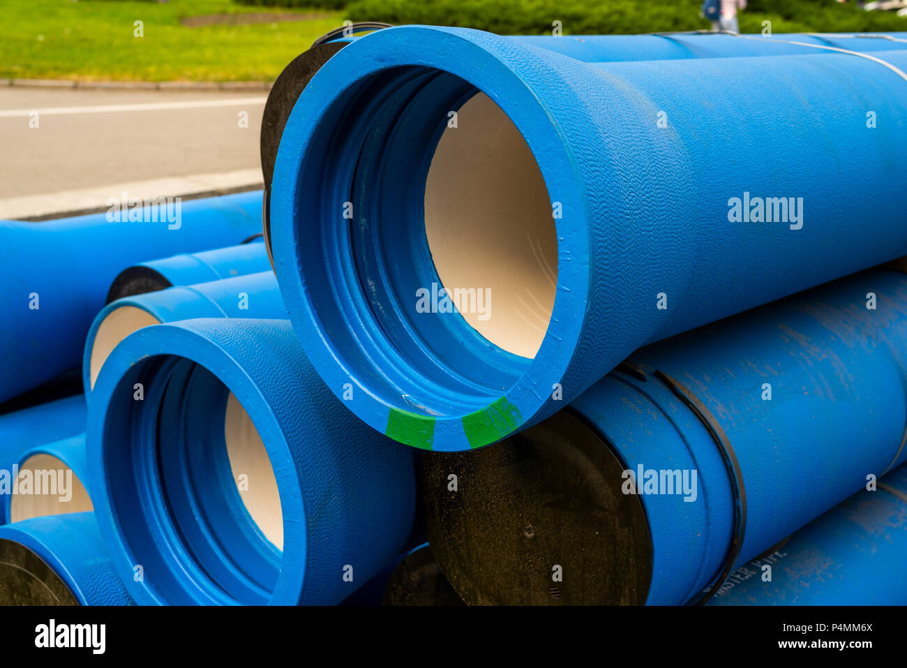 Large blue water pipes for water supply repair Stock Photo - Alamy