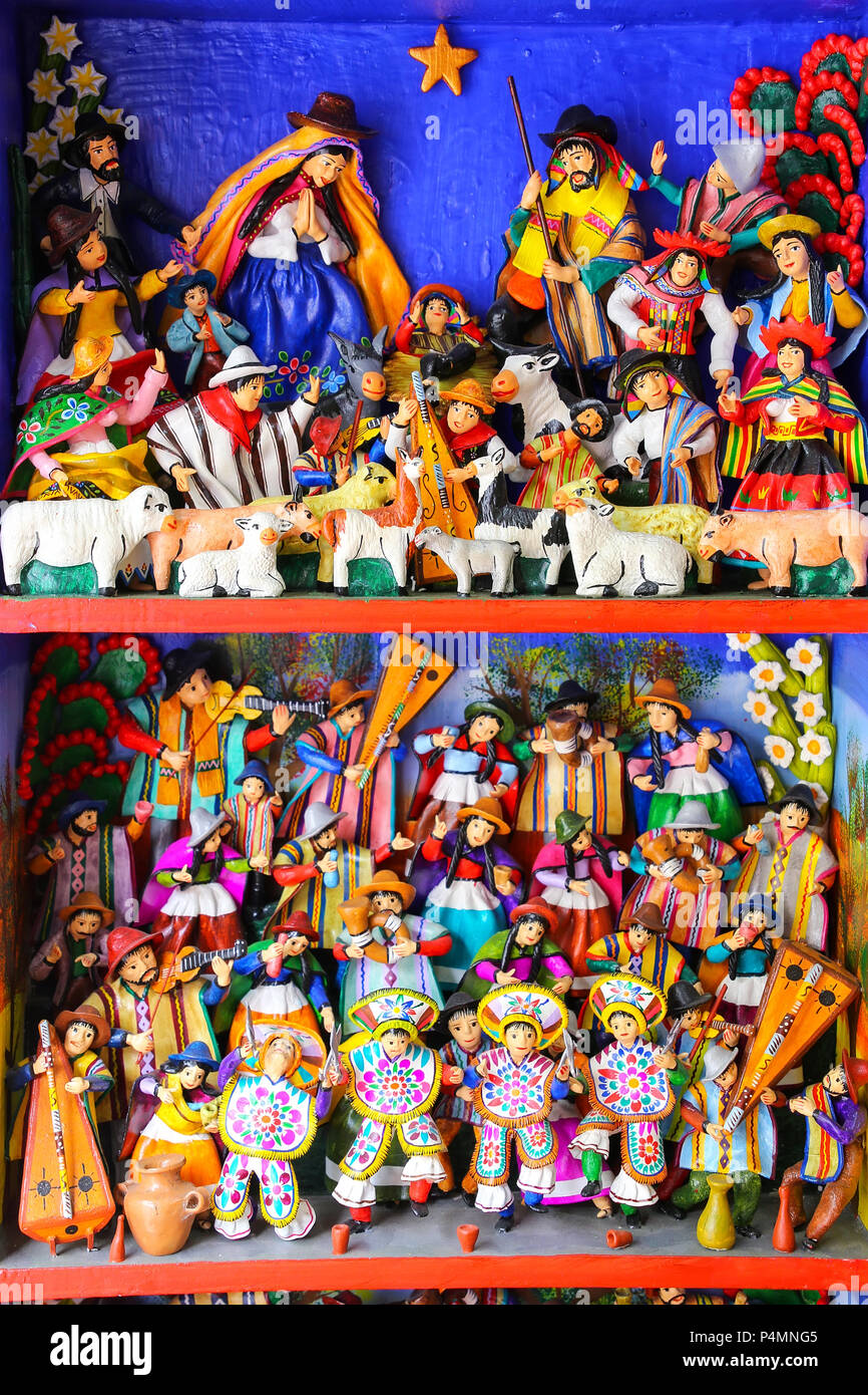 Display of traditional souvenir figures at the market in Lima, Peru ...