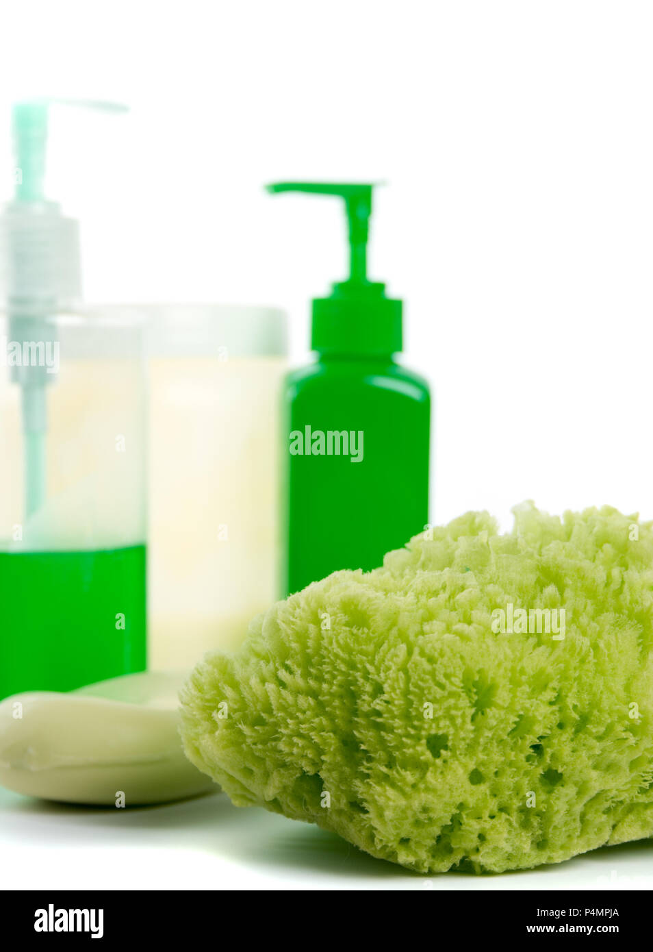 natural sponge, soap and body lotion on white background Stock Photo ...