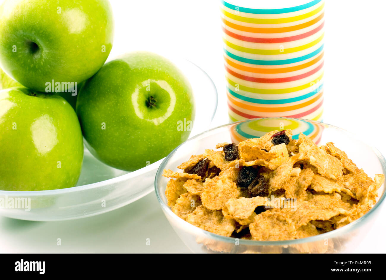 healthy breakfast: cornflakes, glass of milk and green apples Stock ...