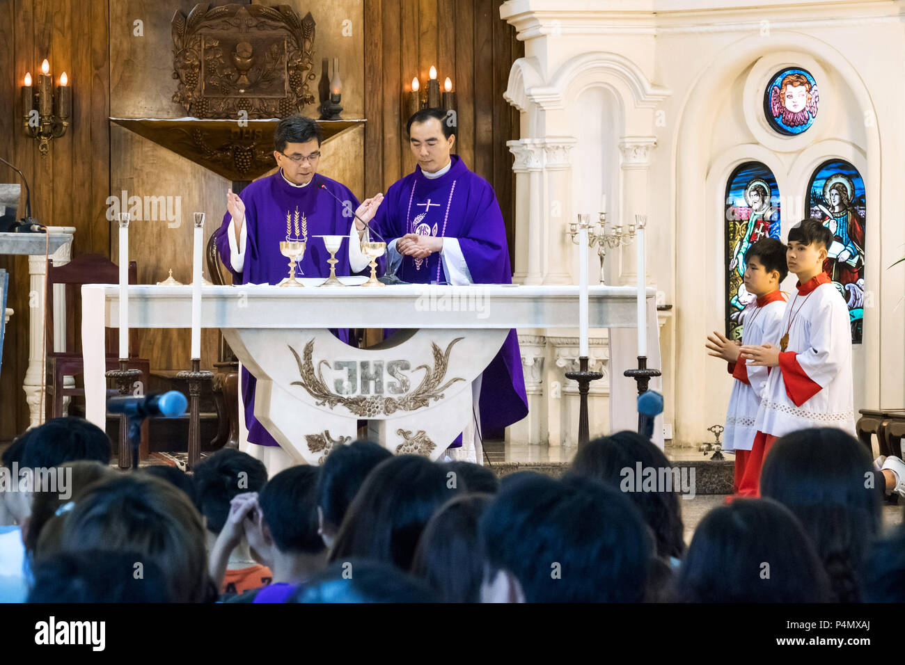 Holy communion, eucharist during sunday Mass in the Catholic Church of ...